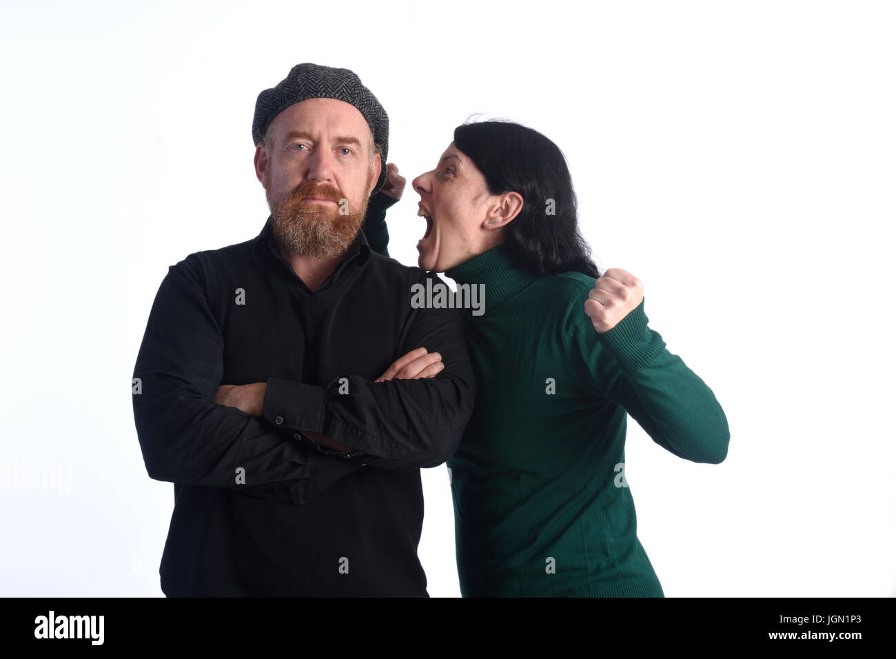 A woman who shouts to the deaf ears of a man Stock Photo - Alamy