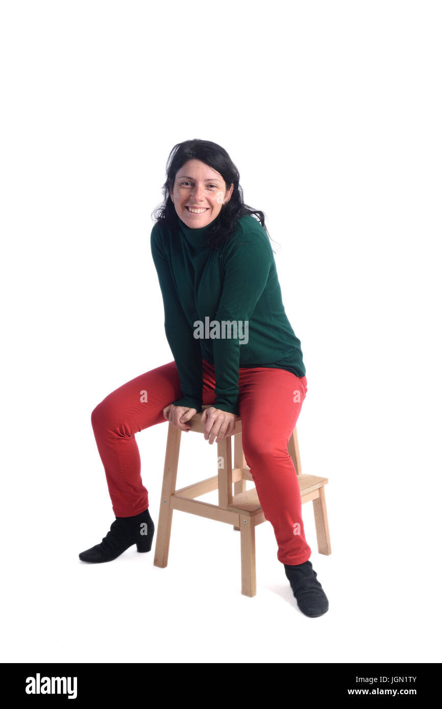 Portrait of a woman sitting with white background Stock Photo - Alamy