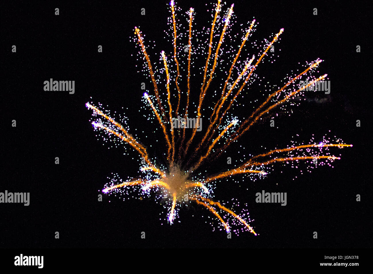 Multi-colored fireworks in the night sky Stock Photo - Alamy
