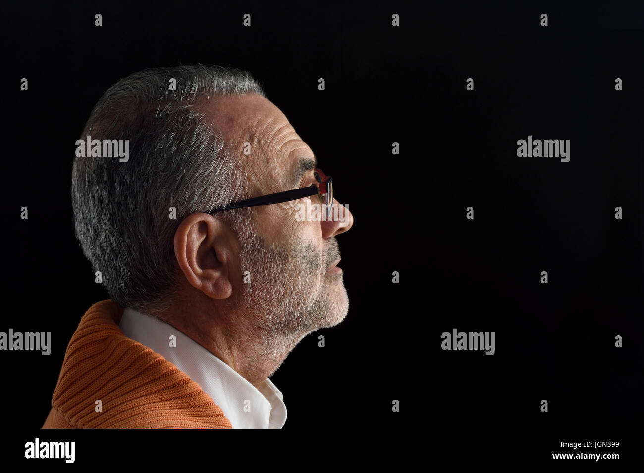Portrait of a man with black background Stock Photo - Alamy