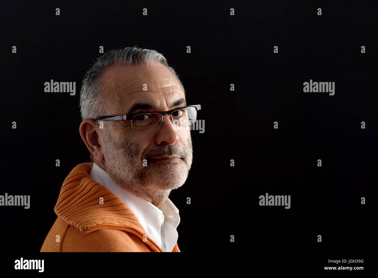 Portrait of a man with black background Stock Photo - Alamy