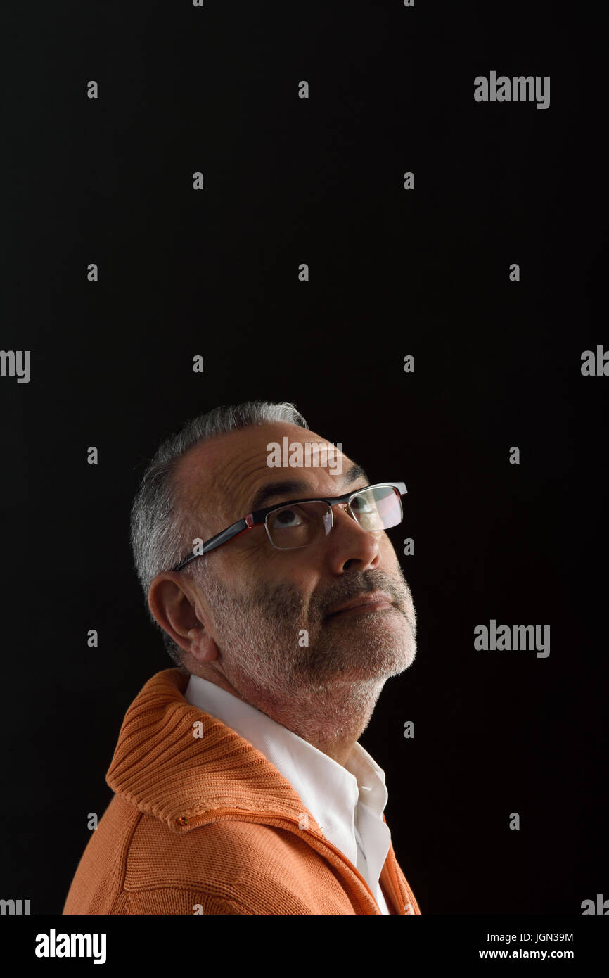 Portrait of a man with black background Stock Photo - Alamy