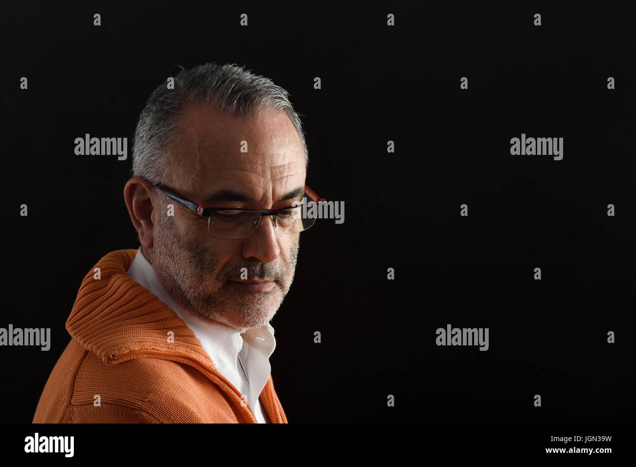 Portrait of a man with black background Stock Photo - Alamy