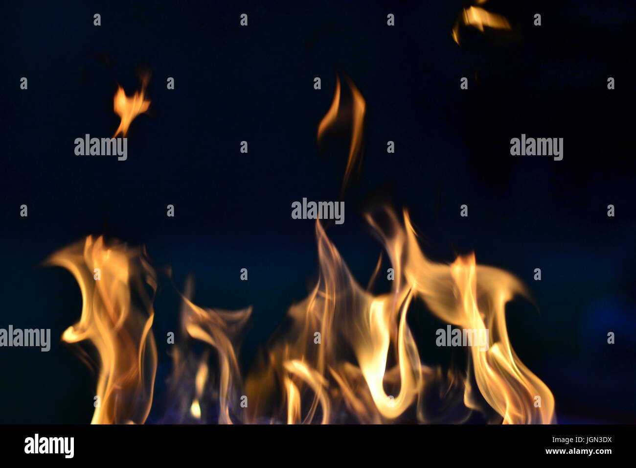 Fire in the night Stock Photo - Alamy