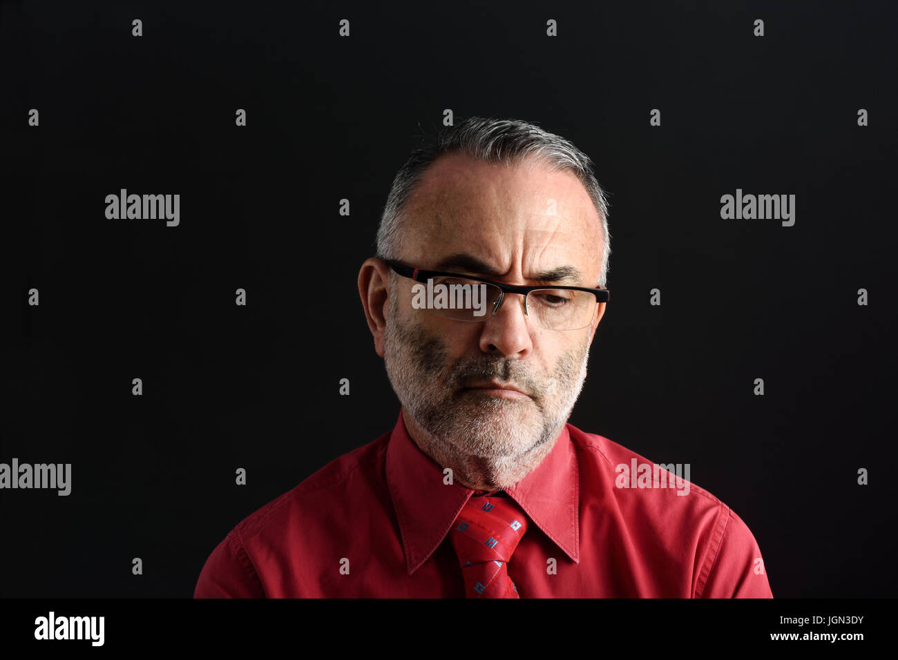 Portrait of a man with black background Stock Photo - Alamy