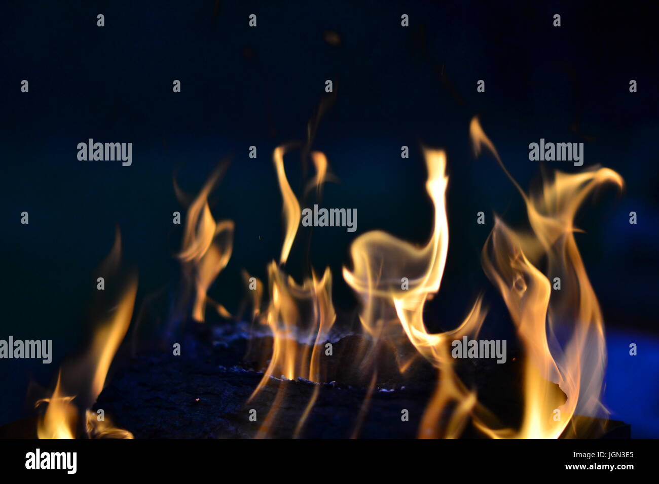 Fire in the night Stock Photo - Alamy