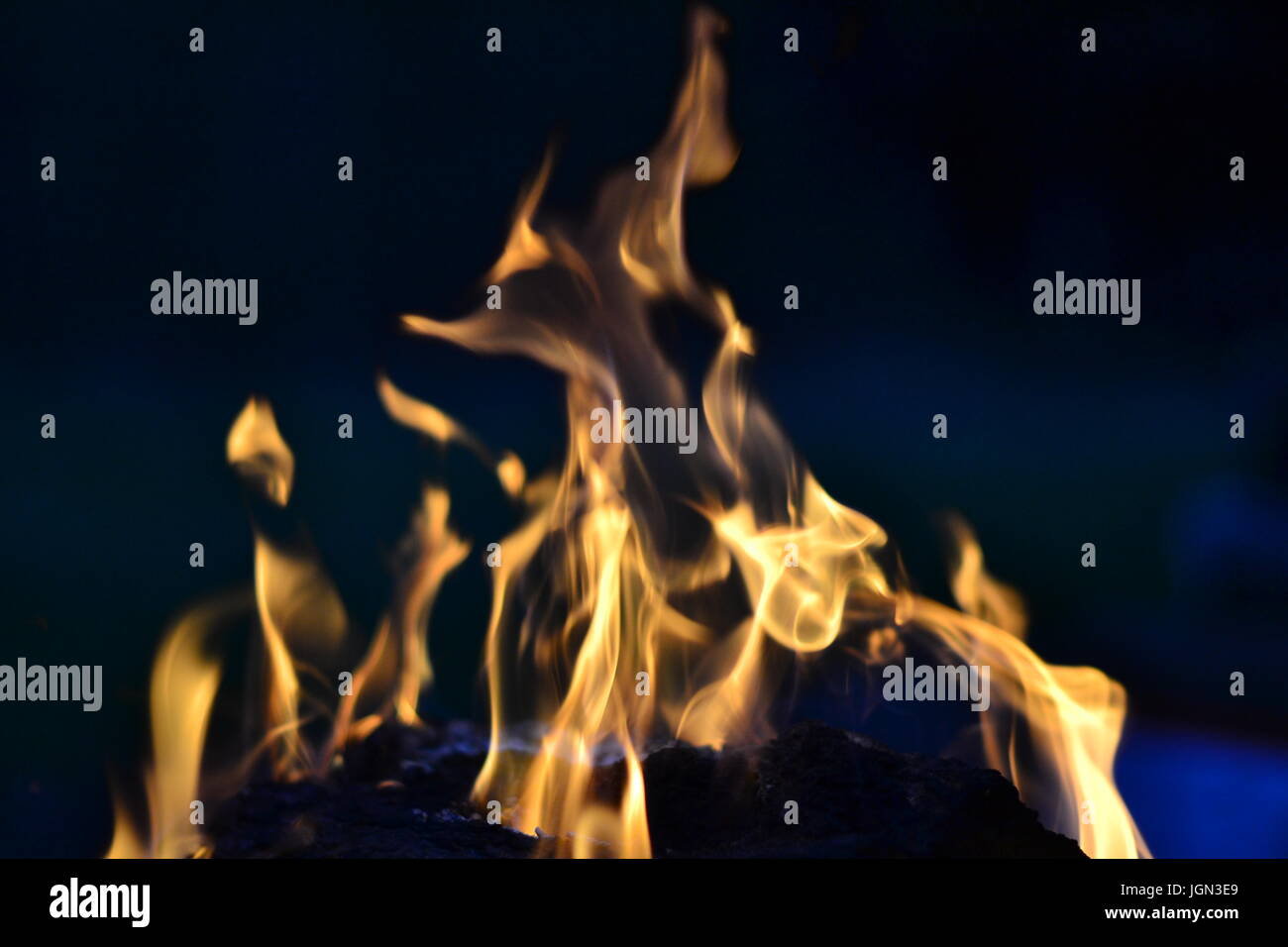 Fire in the night Stock Photo - Alamy