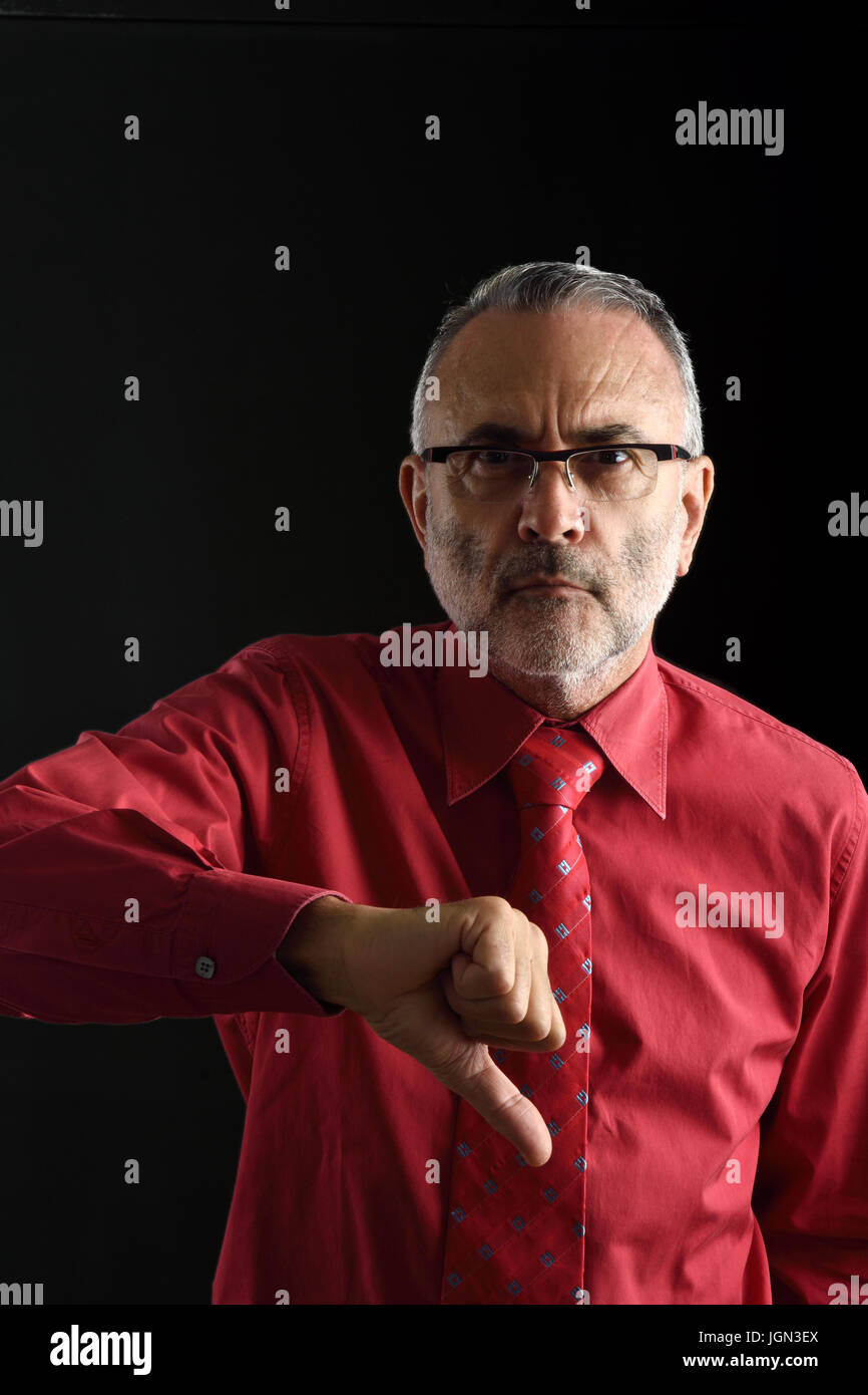 Man with thumb down Stock Photo - Alamy