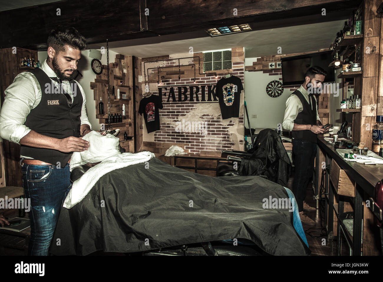Barber cutting hair spain hi-res stock photography and images - Alamy
