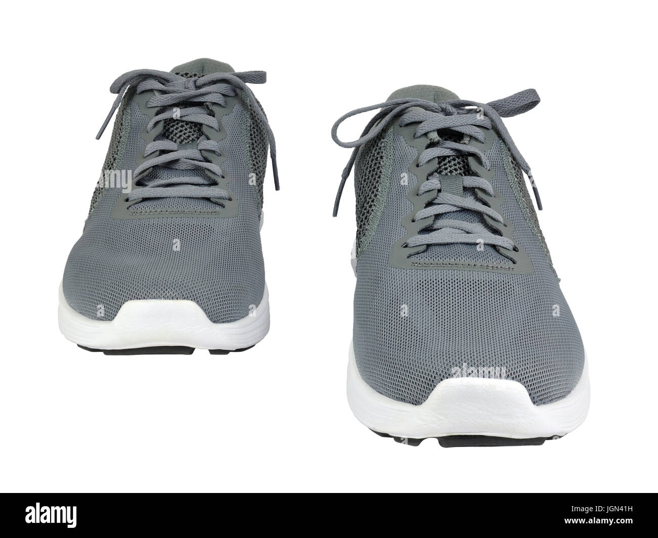 Pair of gray sneakers on white background Stock Photo - Alamy