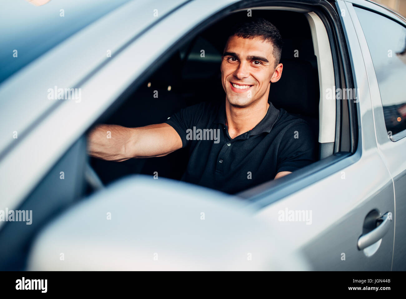 Happy male driver in car, advertising concept. Automobile driving Stock ...