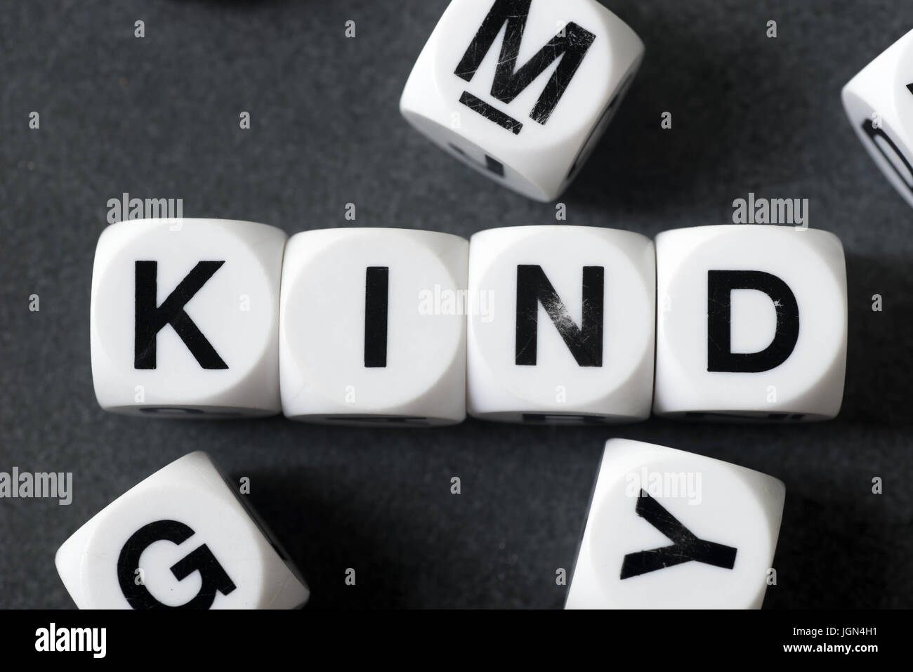 word kind on white toy cubes Stock Photo - Alamy