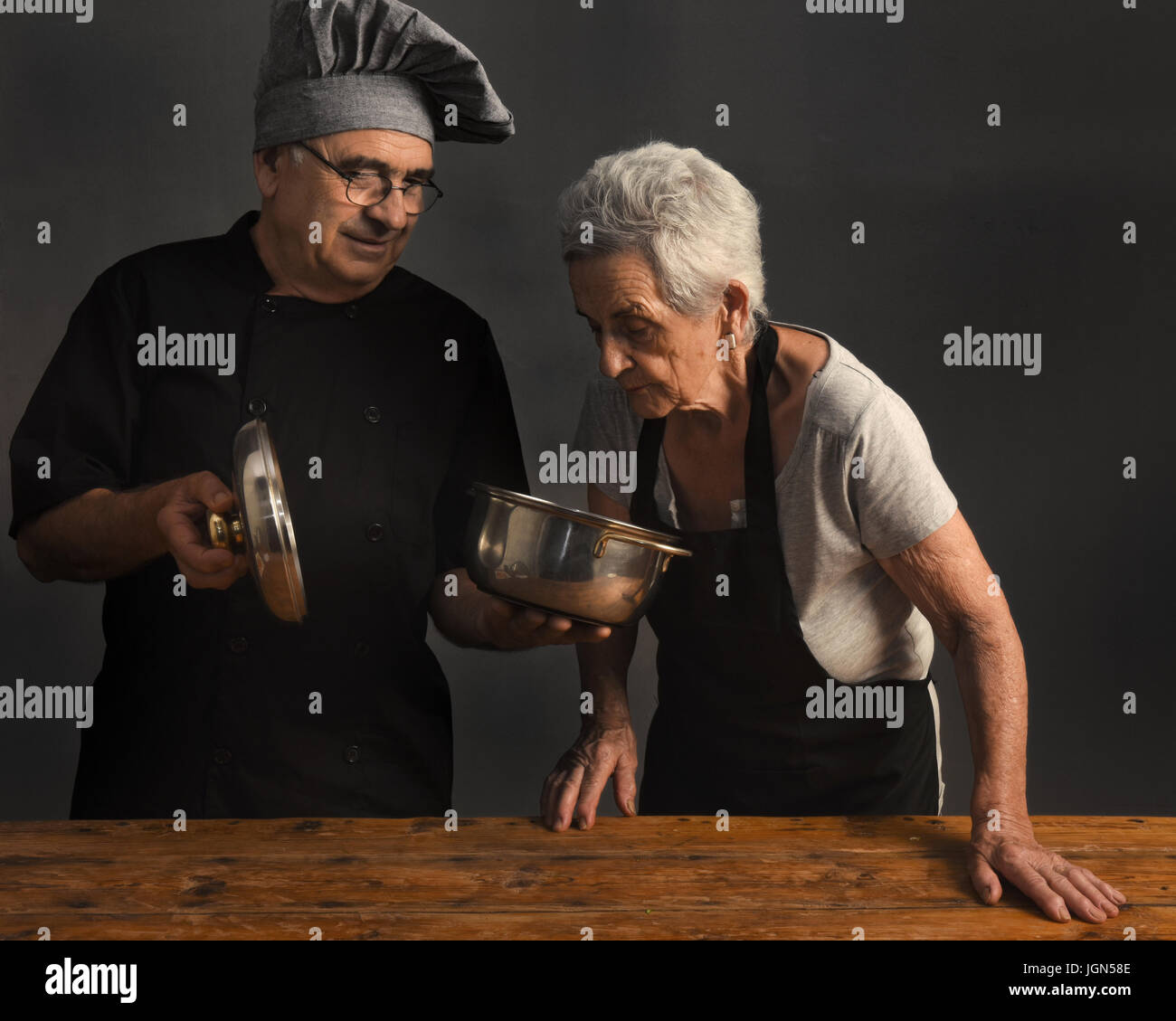 older couple cooks Stock Photo - Alamy