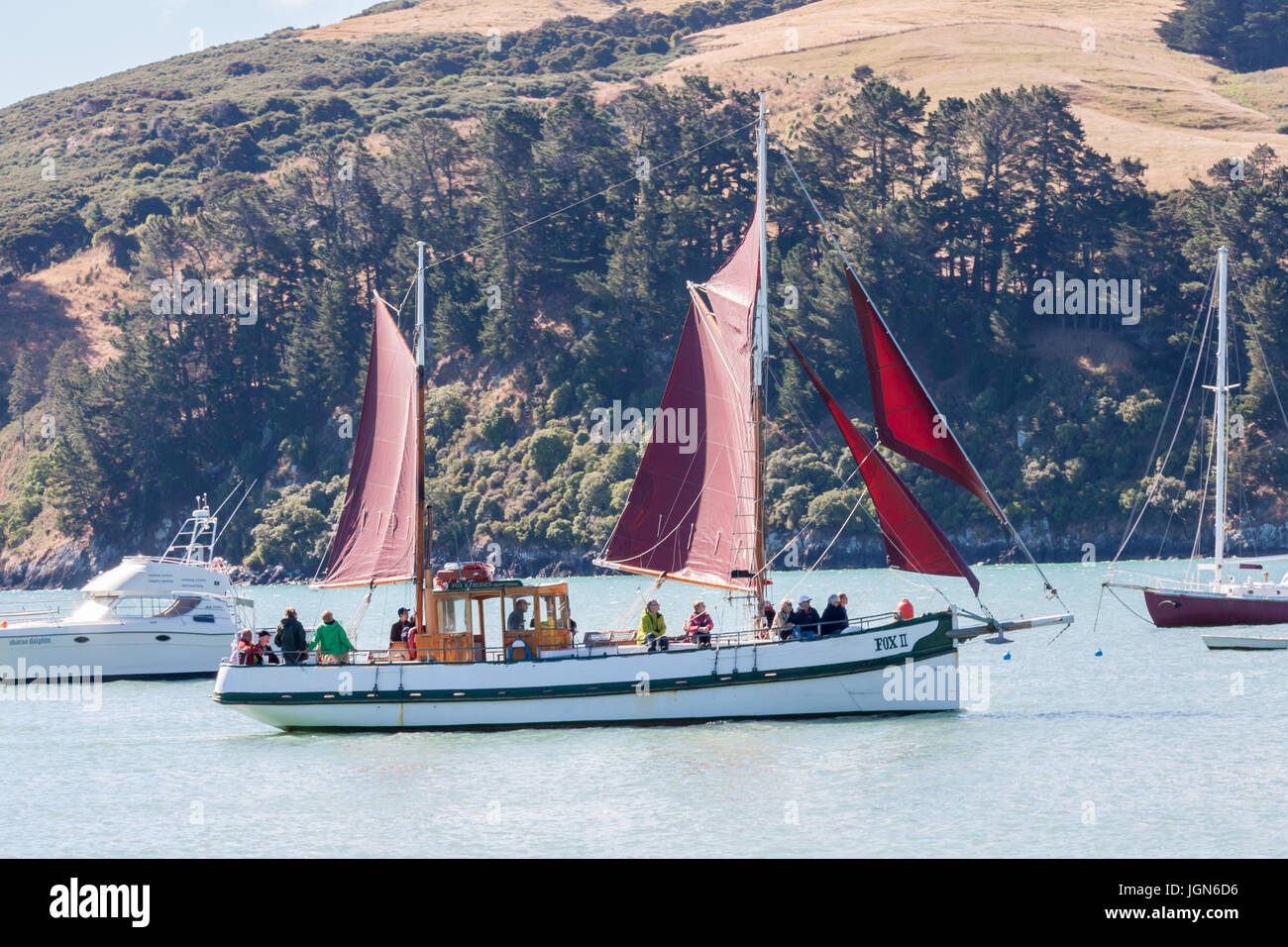 Yacht under sail in Akaroa harbour, South Island, New Zealand Stock ...