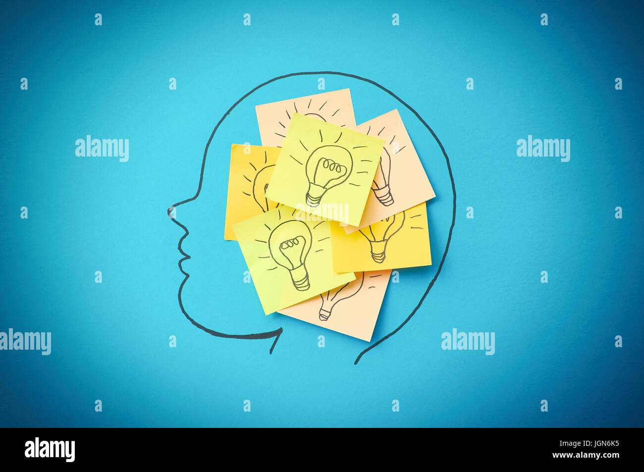 Sticky notes with light bulbs on head, illustration Stock Photo - Alamy