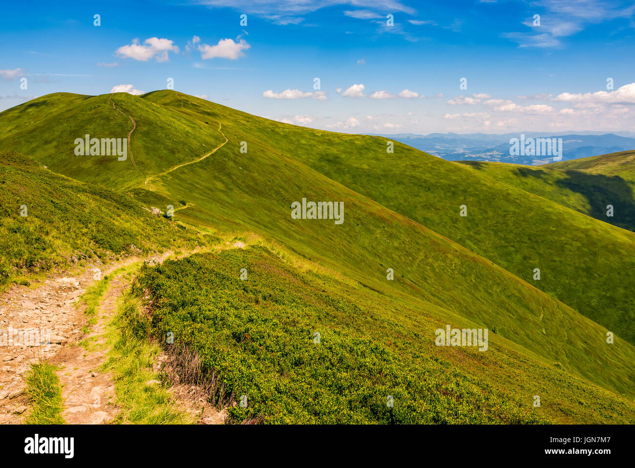 summer mountain landscape. footpath uphill through the ridge to the ...
