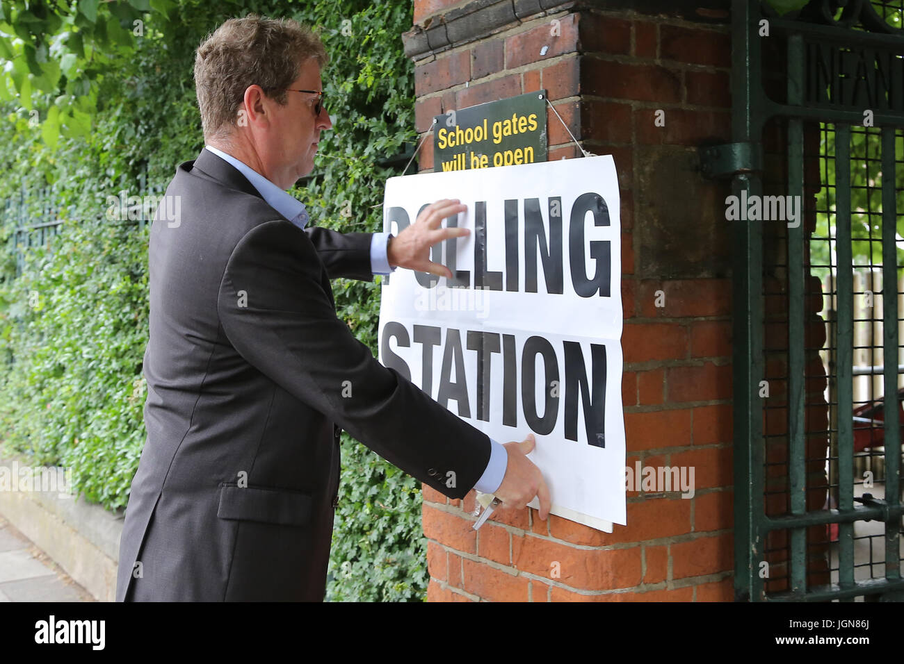Voters arrive at a polling station in Chestnuts Primary School in ...