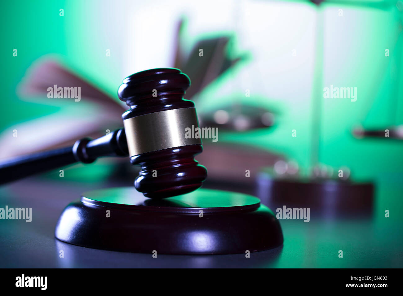 Business and law theme. Gavel and different codes of economic activity ...