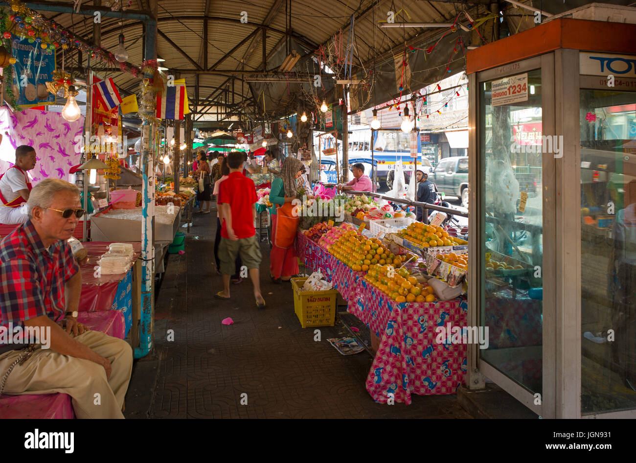 Fruit and other goods on sale in covered street market. Nonthaburi ...