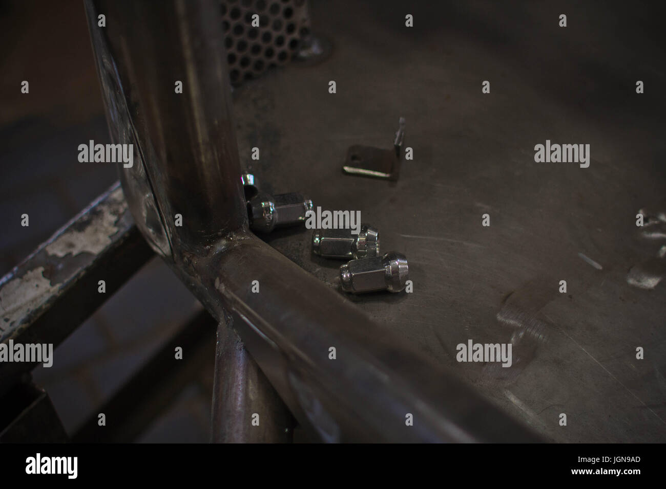 Screw nut bolt bulr on tray on buggy Stock Photo - Alamy