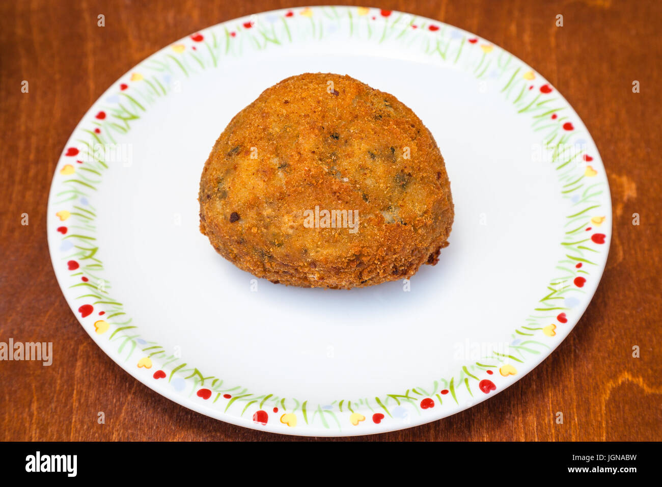 traditional sicilian street food - one vegetable stuffed rice ball ...