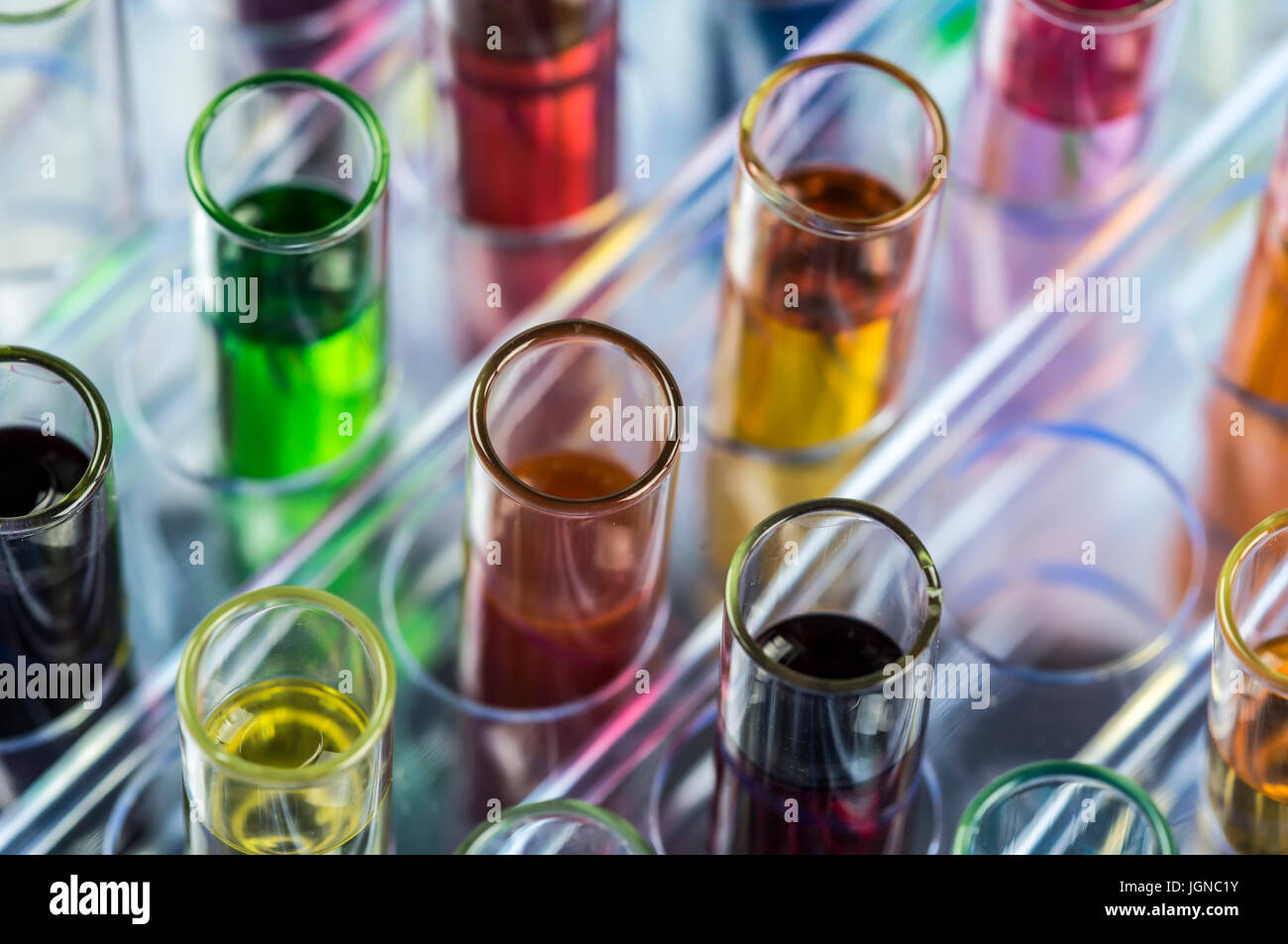 Close up of colorful chemicals in laboratory test tubes Stock Photo - Alamy