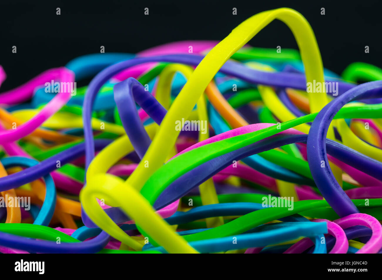 Macro shot of multi colored rubber bands Stock Photo - Alamy