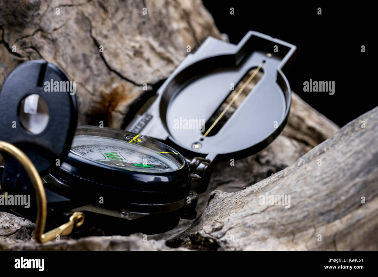 Vintage military compass placed on a tree bark Stock Photo - Alamy