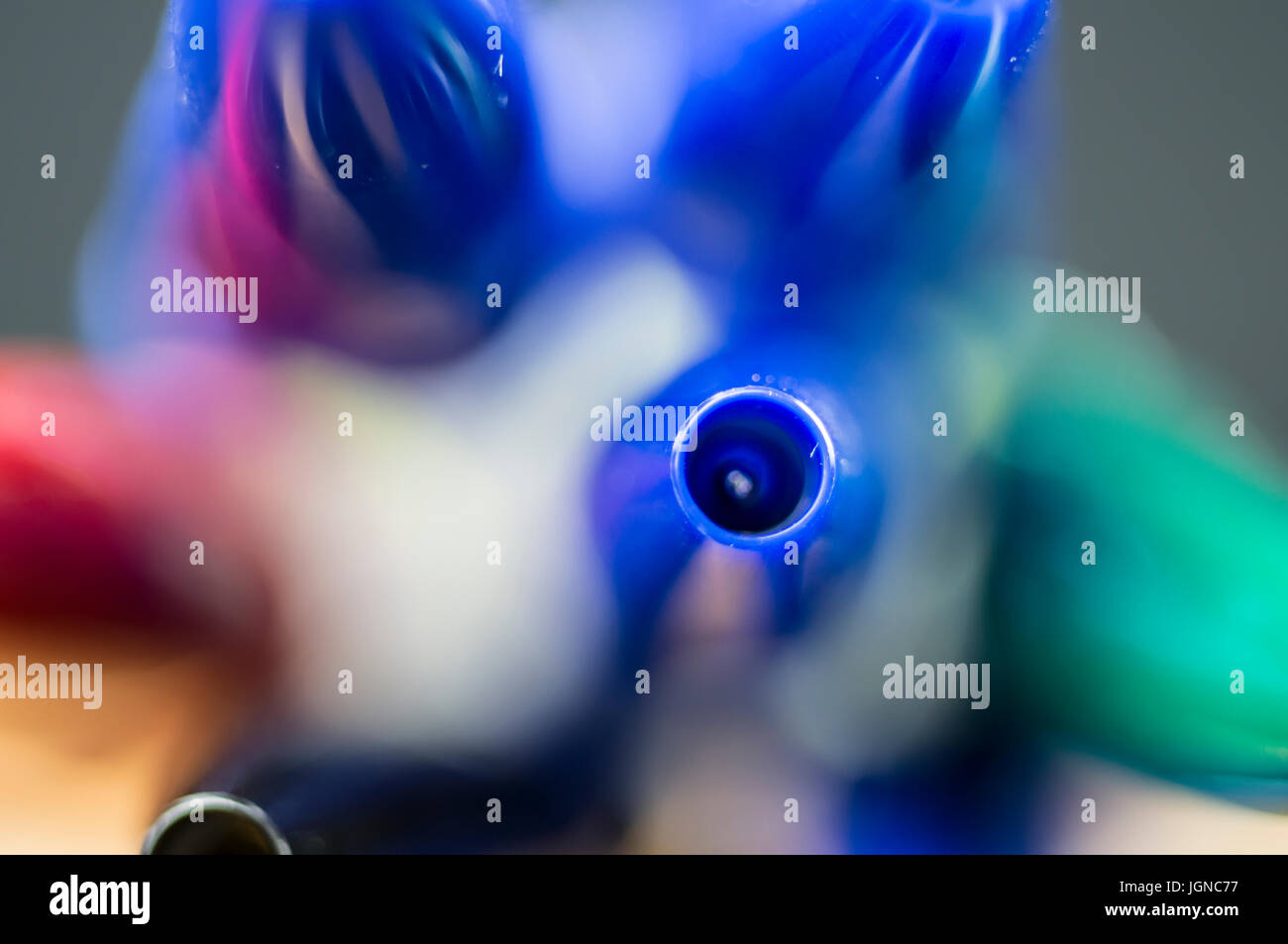 Macro shot of ballpoint pens in red green blue and black colors Stock ...
