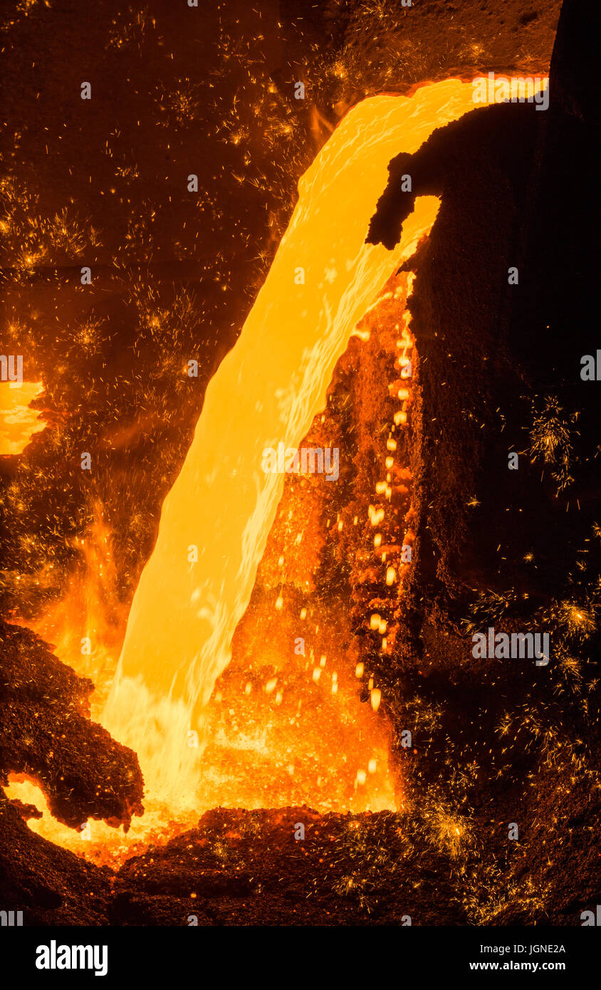 Liquid iron, measuring 1150 degrees Celsius, runs through the slab ...