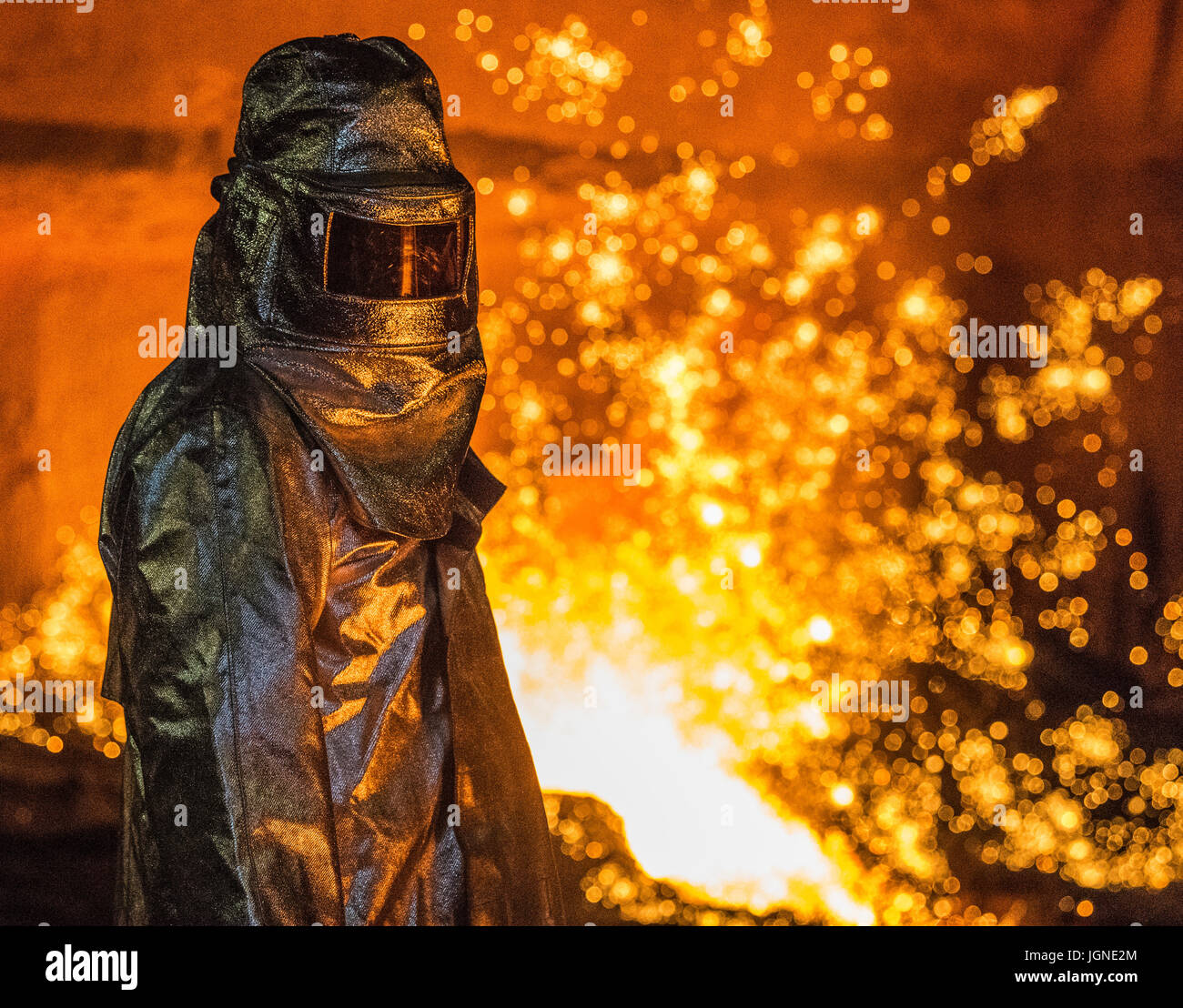 Liquid iron, measuring 1150 degrees Celsius, runs through the slab ...