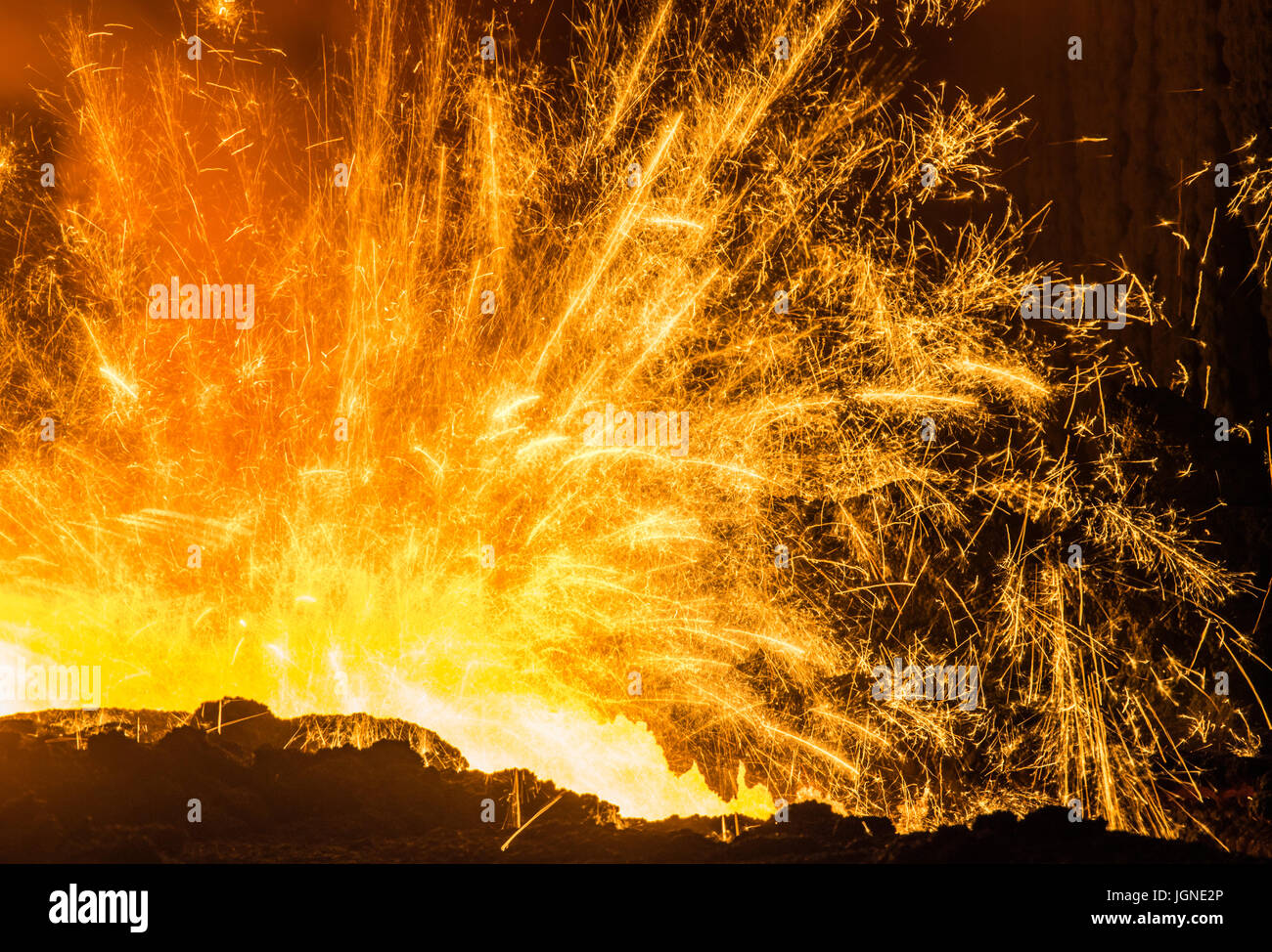 Liquid iron, measuring 1150 degrees Celsius, runs through the slab ...