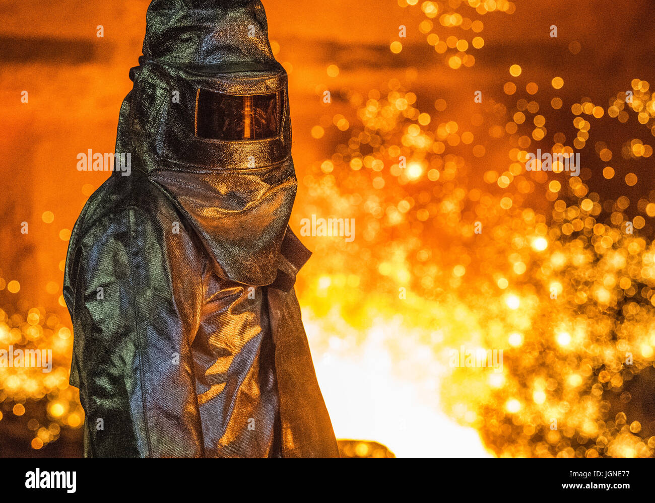 Liquid iron, measuring 1150 degrees Celsius, runs through the slab ...