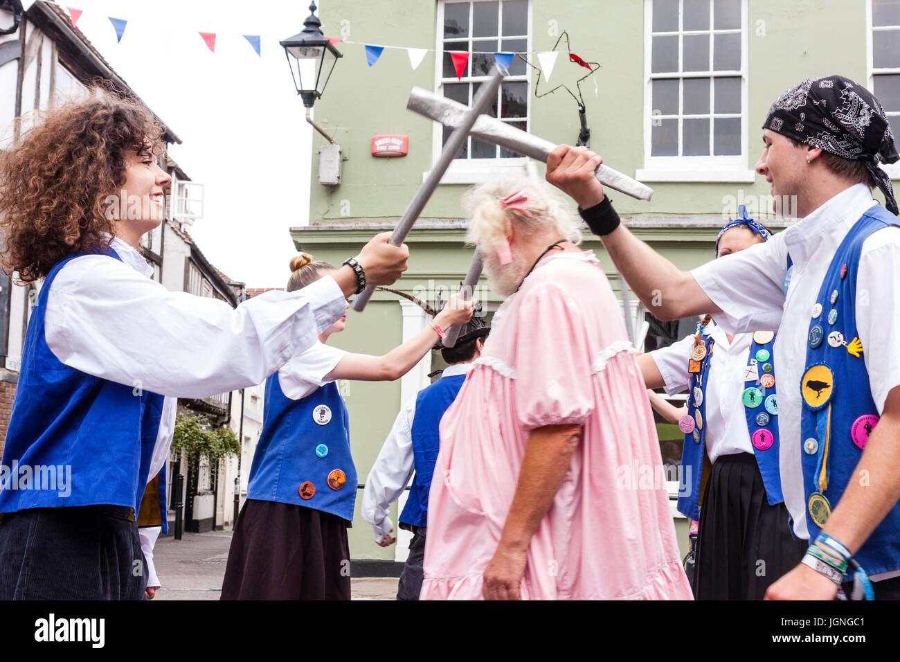 Traditional English folk dancers, Royal Liberty Morris side dancing ...