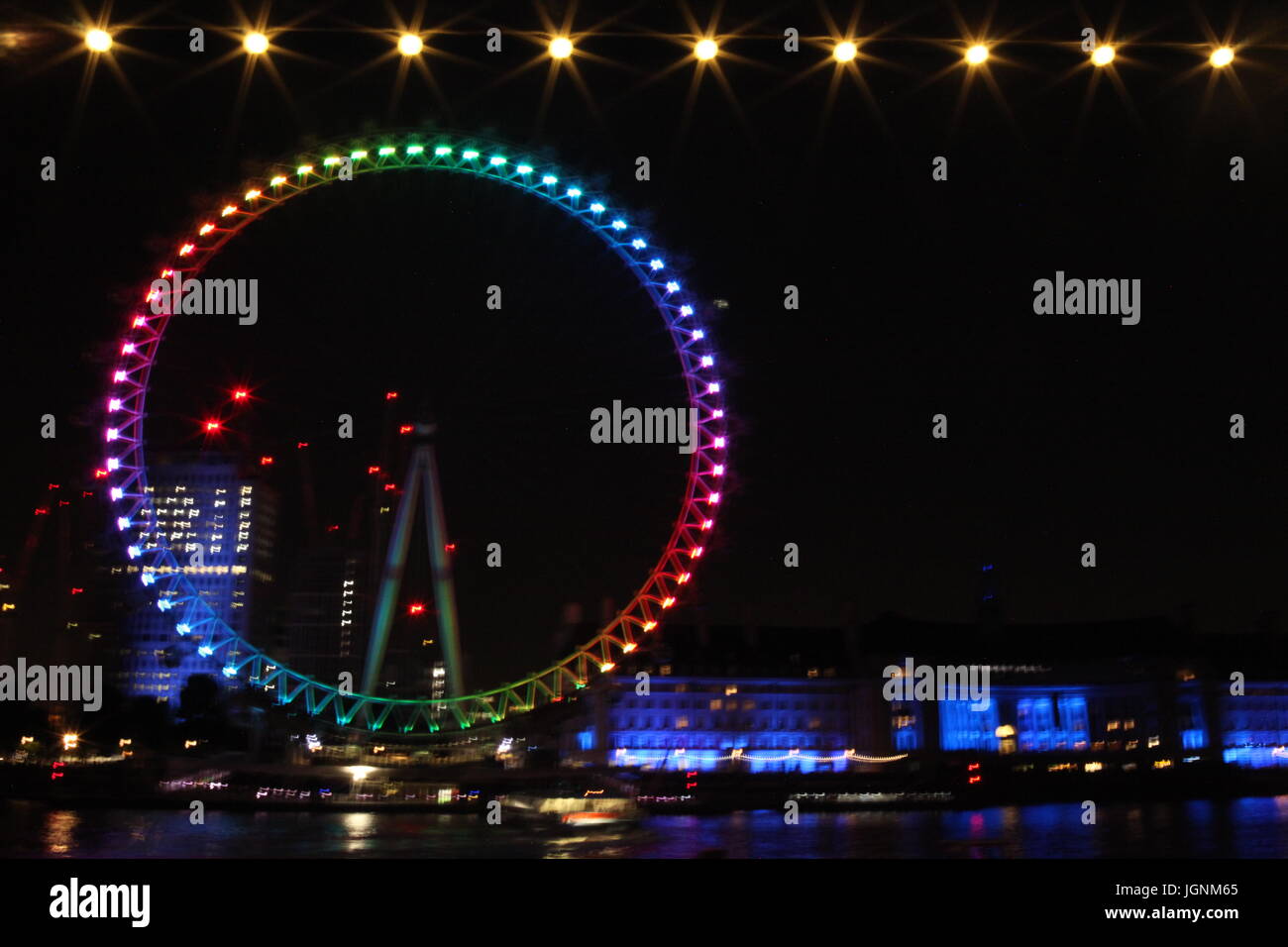 London eye lit up rainbow hi-res stock photography and images - Alamy