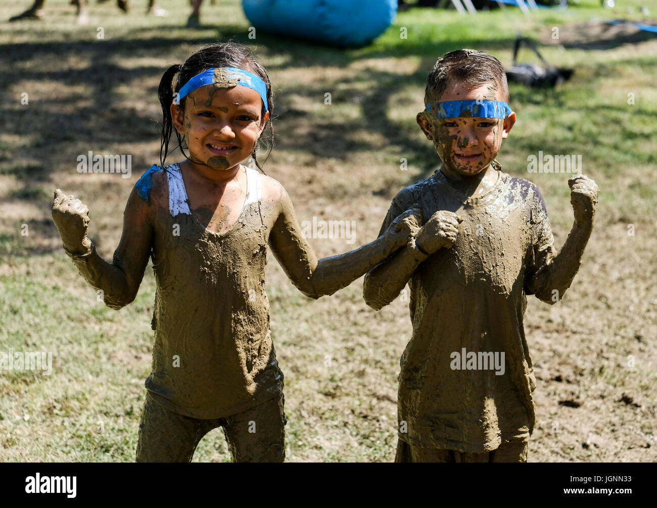 Los Angeles, USA. 8th July, 2017. A boy crosses the mud pit during the ...