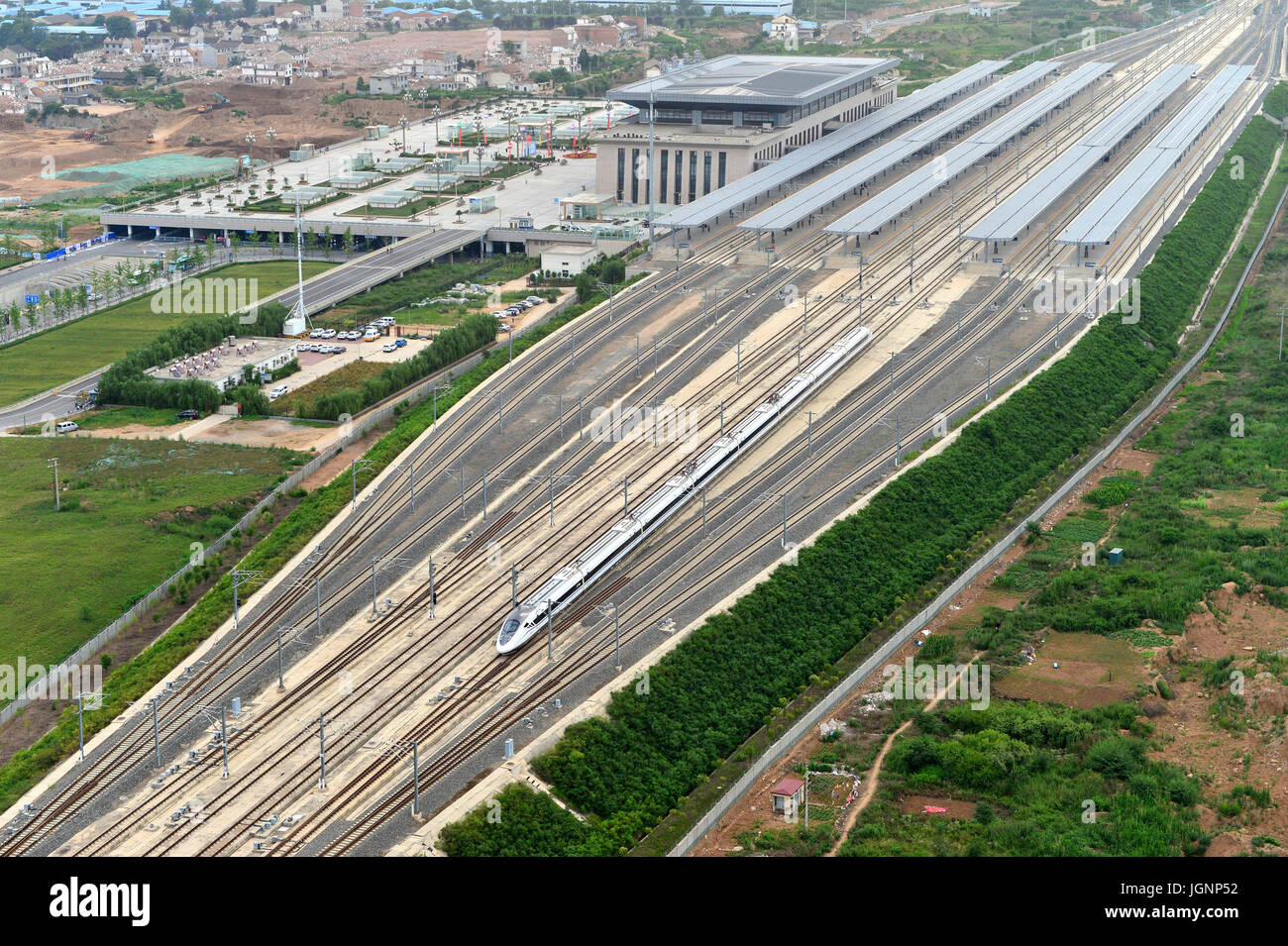 Baoji, China's Shaanxi Province. 9th July, 2017. A bullet train leaves ...