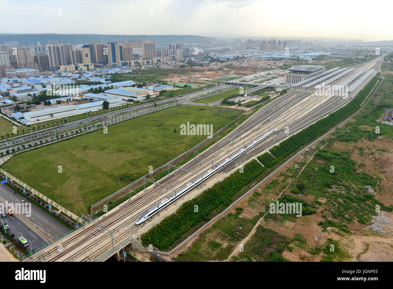 Baoji, China's Shaanxi Province. 9th July, 2017. A bullet train leaves ...