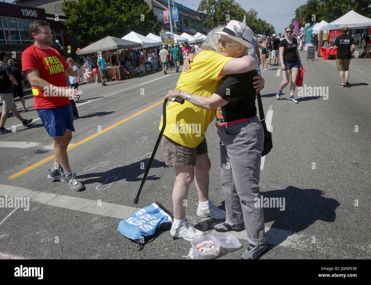 Vancouver, Canada. 8th July, 2017. People give a hug to each other ...