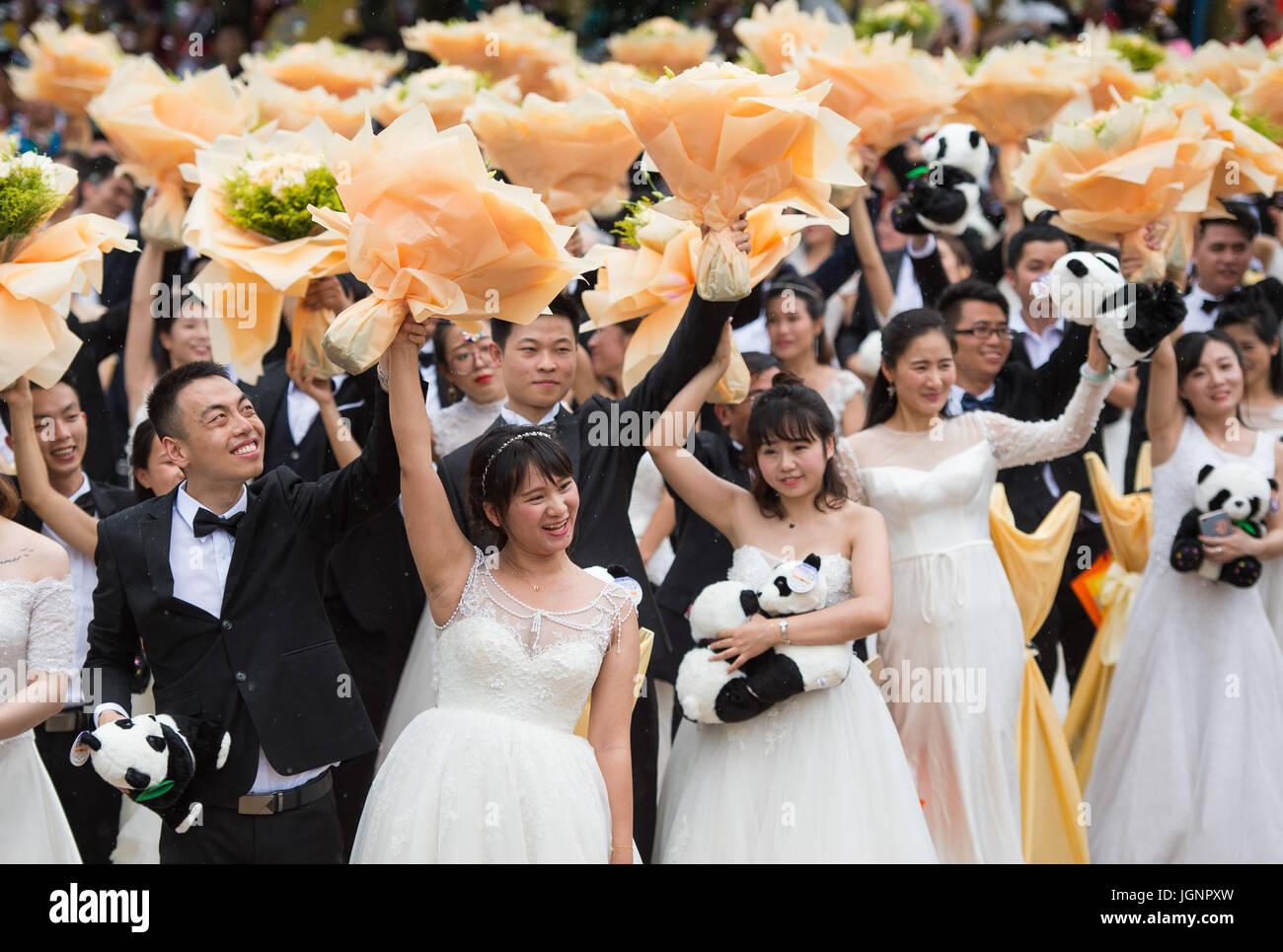 Guangzhou, China's Guangdong Province. 8th July, 2017. Couples attend a ...