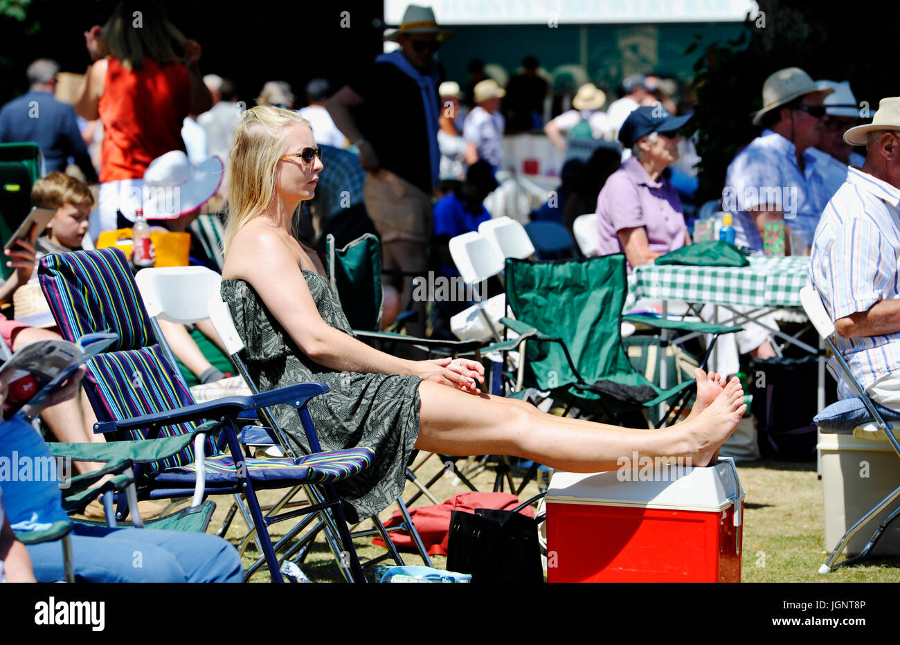 Hot weather fan feet up hi-res stock photography and images - Alamy