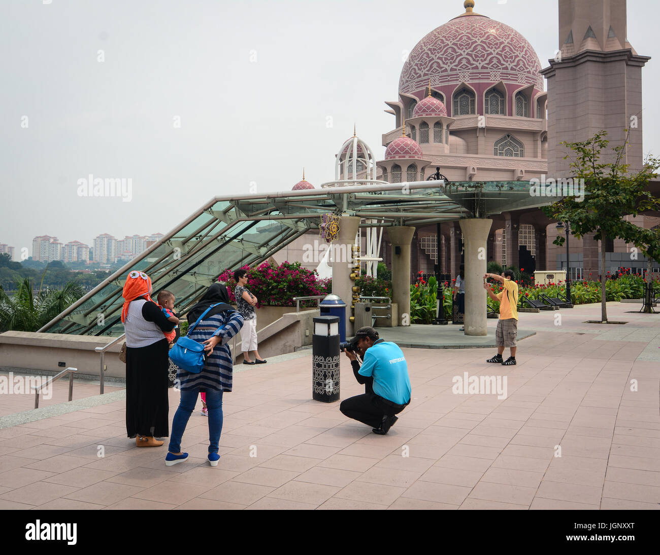 Putrajaya, Malaysia - Jul 7, 2015. People visit the Putrajaya Mosque ...