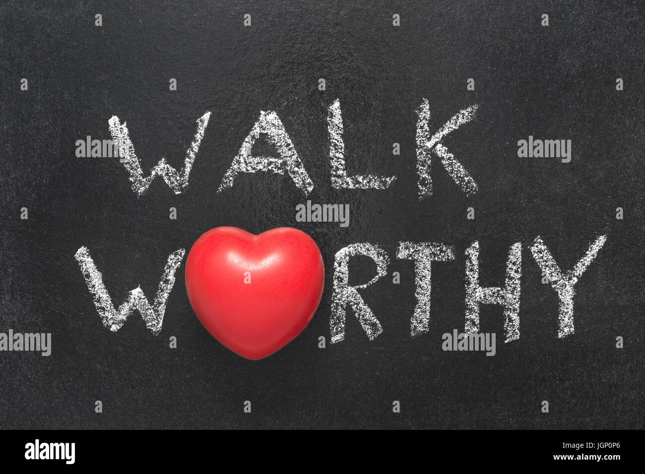 walk worthy phrase handwritten on blackboard with heart symbol instead ...