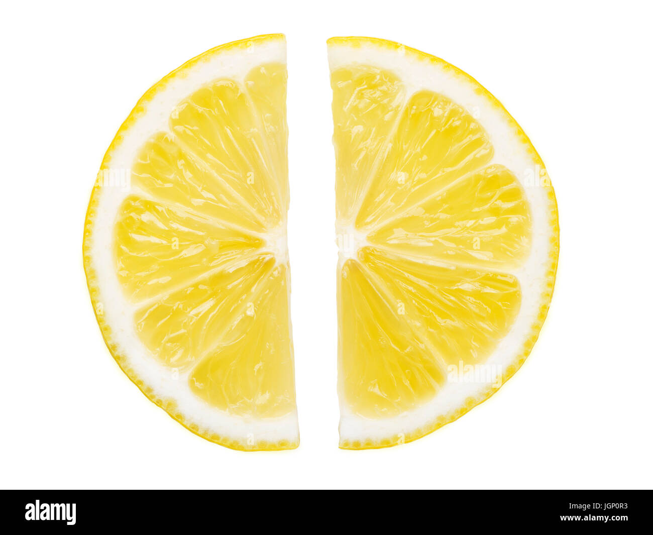 lemon slice divided on two halves, isolated on white Stock Photo - Alamy
