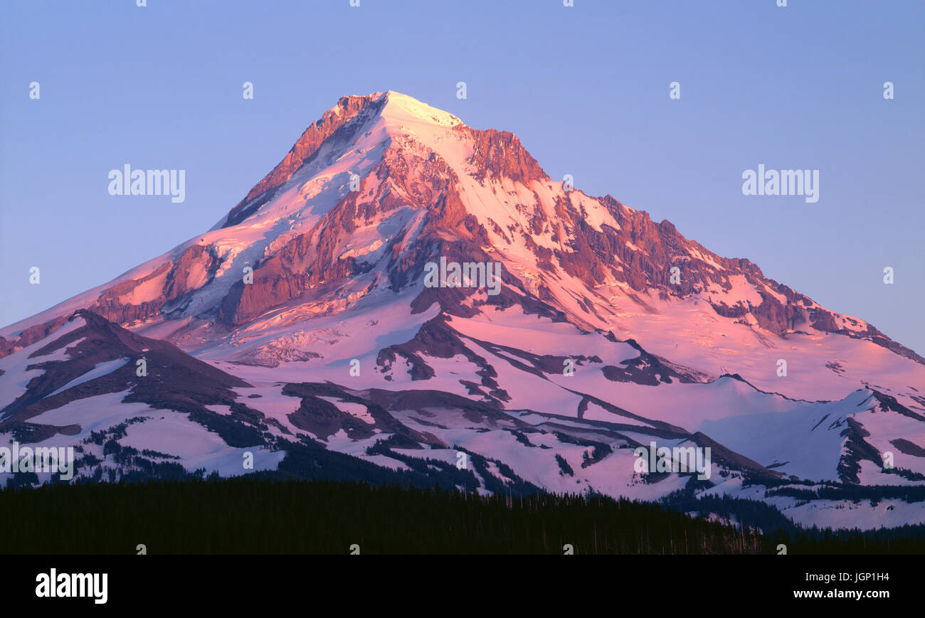 USA, Oregon, Mount Hood National Forest, Sunset light on north side of ...