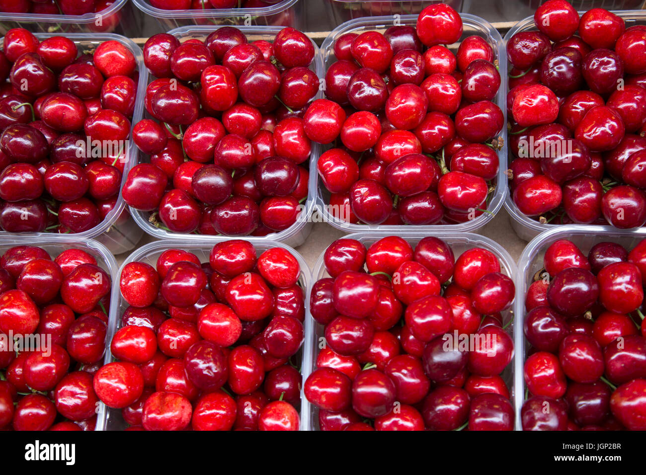 Red Cherry Background on Market Stall Stock Photo - Alamy