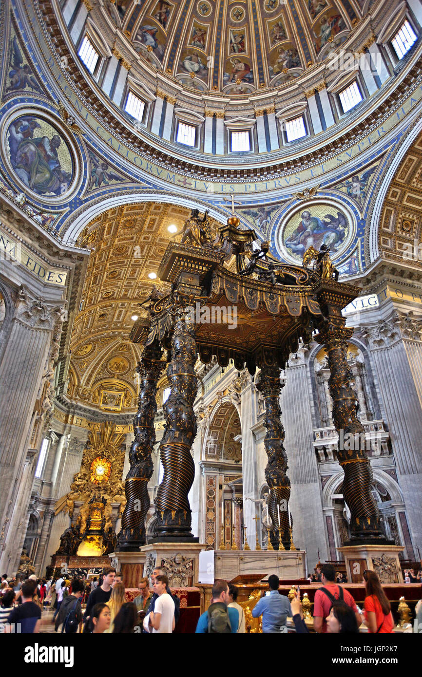 The Bernini's baldachin (canopy) under the imposing dome of St. Peter's Basilica, Vatican City ...