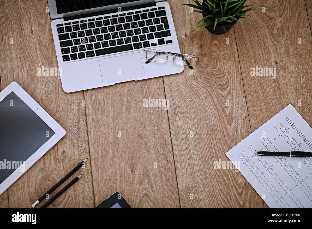Office workplace with a laptop and documents Stock Photo - Alamy