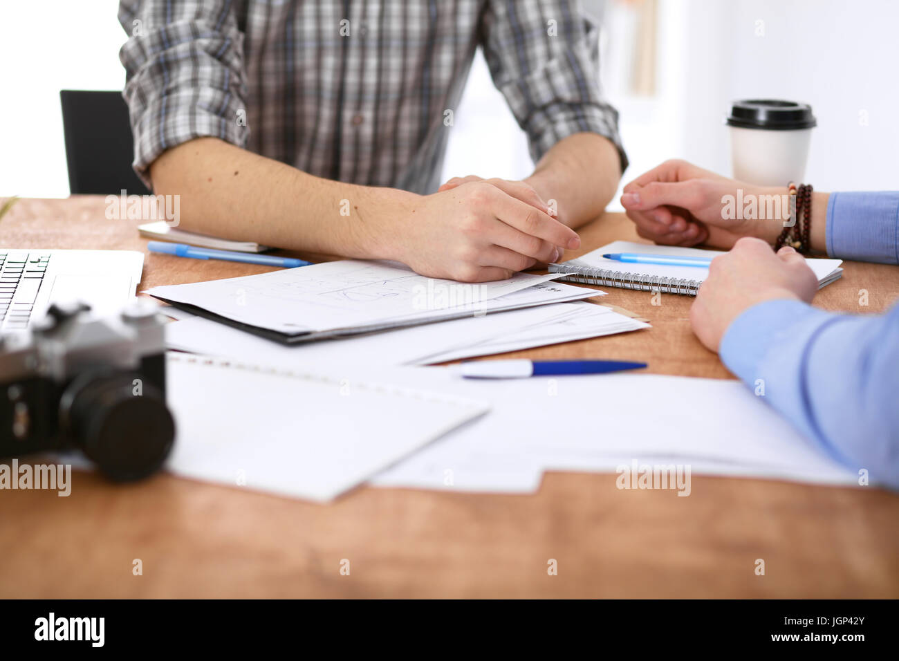Business people meeting around table. Casual closing style Stock Photo ...