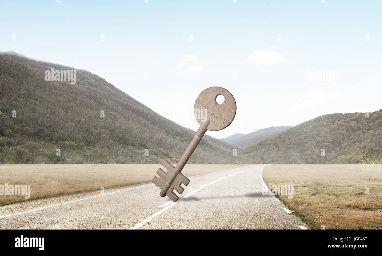 Conceptual background image of concrete key sign on asphalt road Stock ...